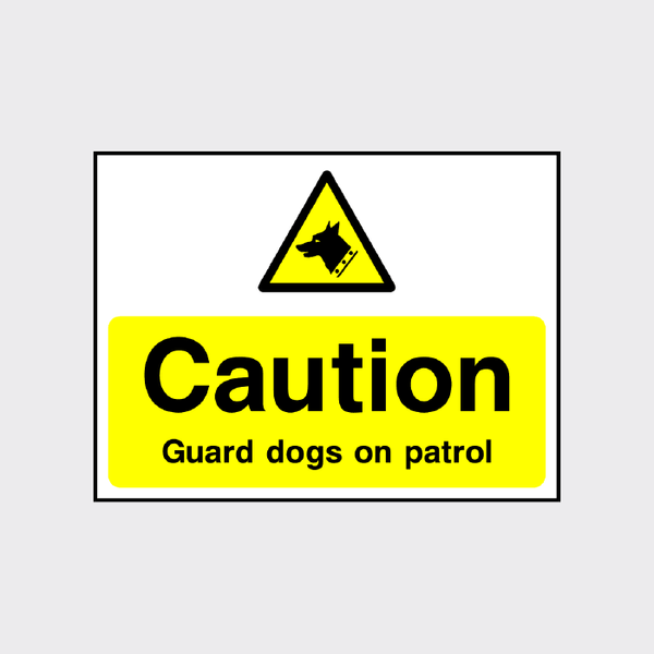 Caution Guard dogs on patrol sign